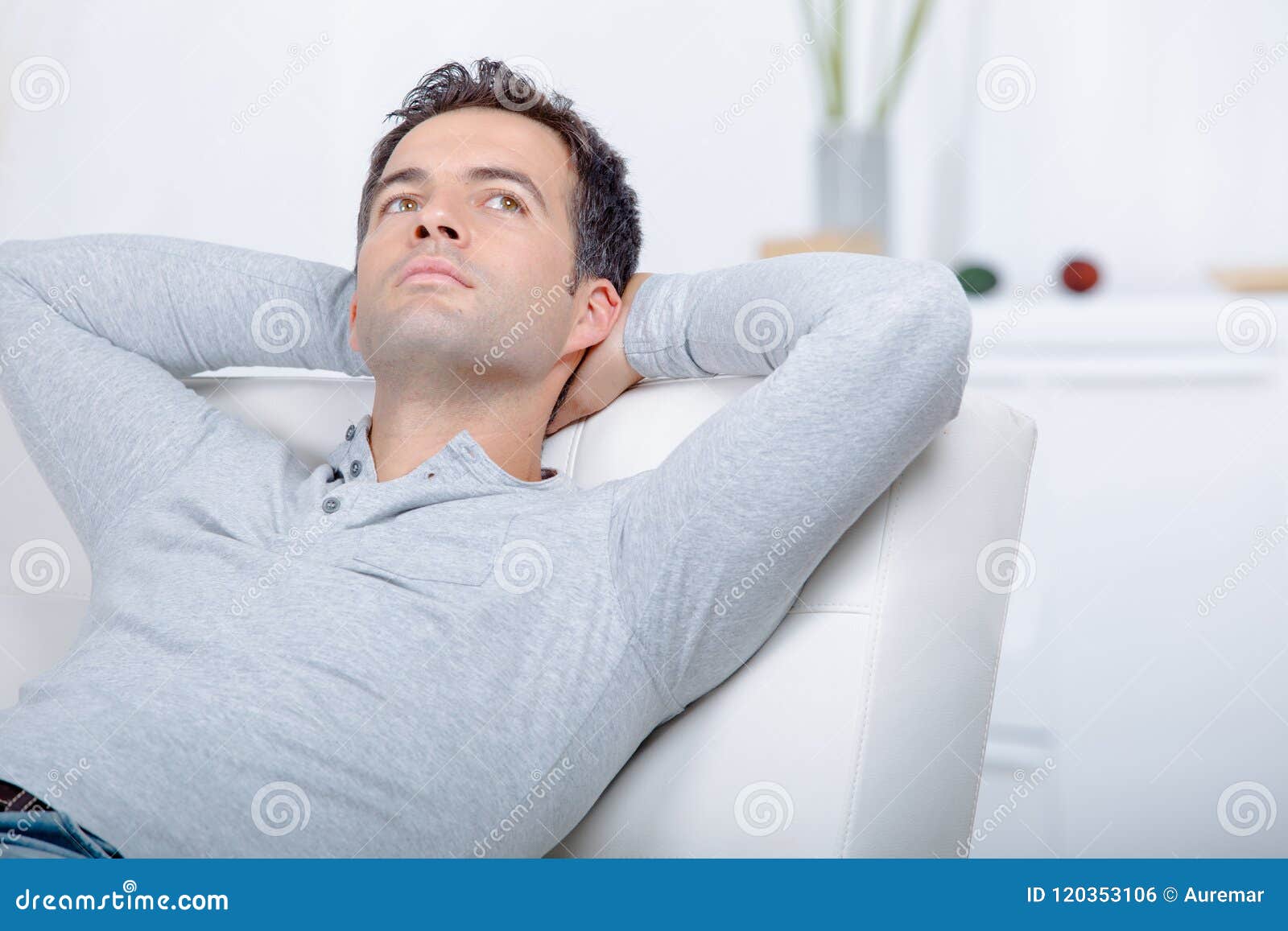 Man Relaxing in Sofa at Home Stock Photo - Image of restful, relaxed ...