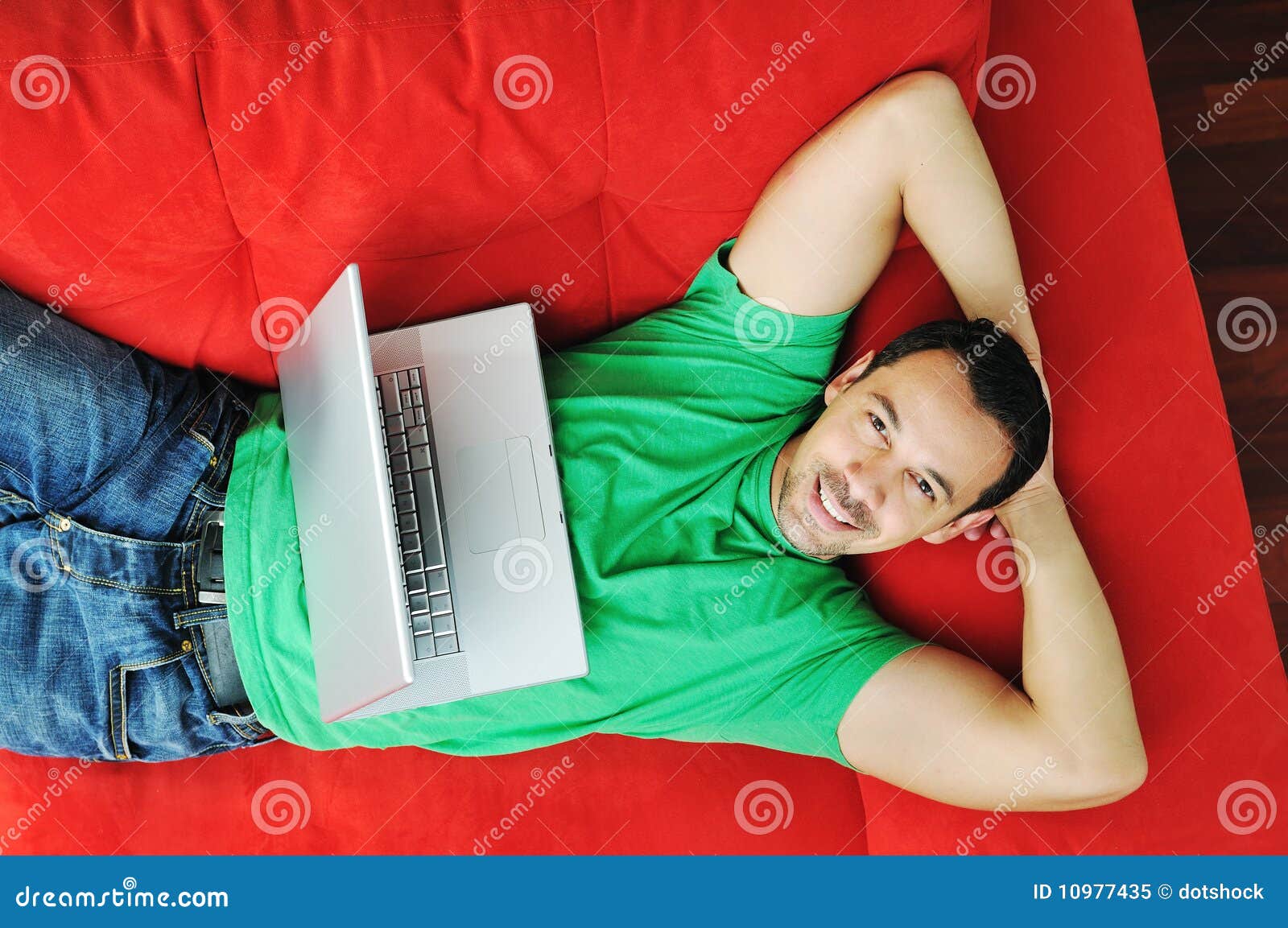 Man Relaxing on Sofa and Work on Laptop Computer Stock Image - Image of ...