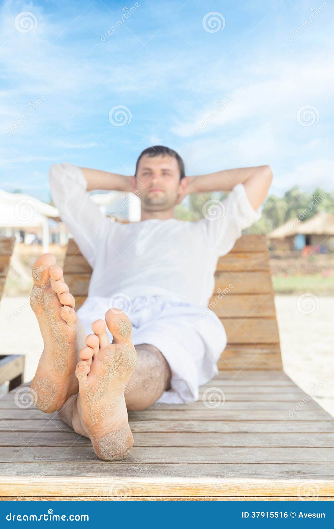 Man Relaxing in Tropical Resort Stock Photo - Image of happiness, sand ...