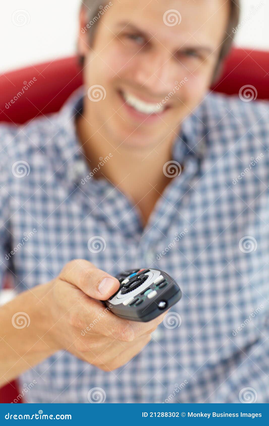 Man with remote control stock photo. Image of camera - 21288302