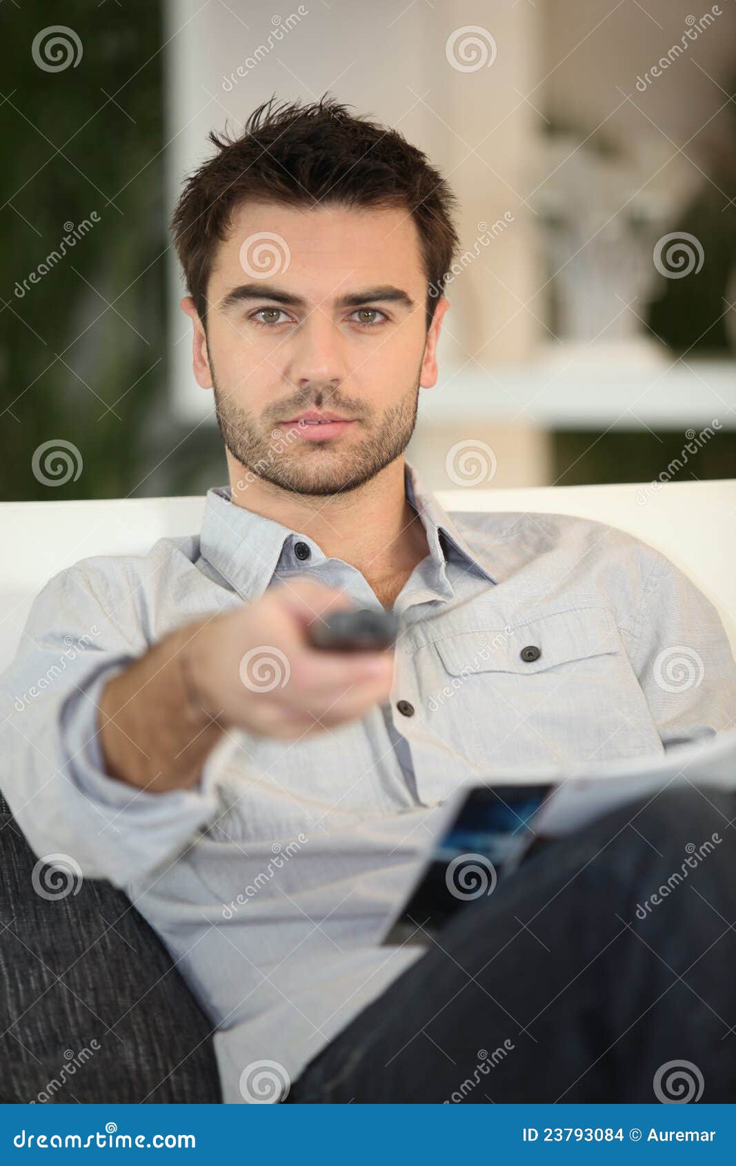 Man with remote control stock photo. Image of male, novelty - 23793084