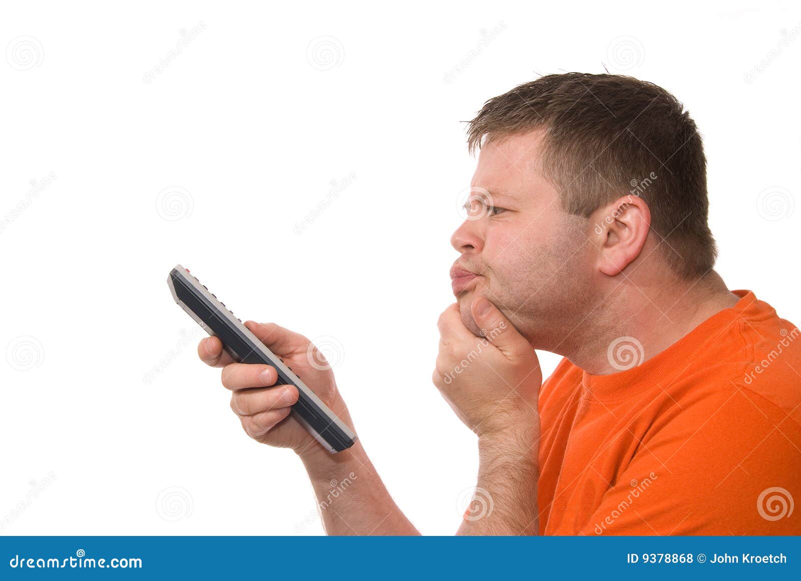 Man with Remote Control stock photo. Image of male, average - 9378868