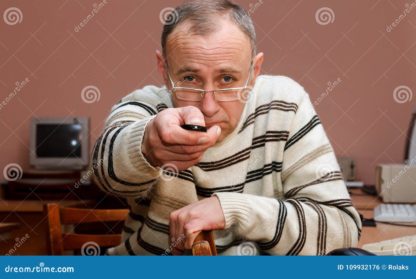 Man with remote control stock photo. Image of pose, close - 109932176