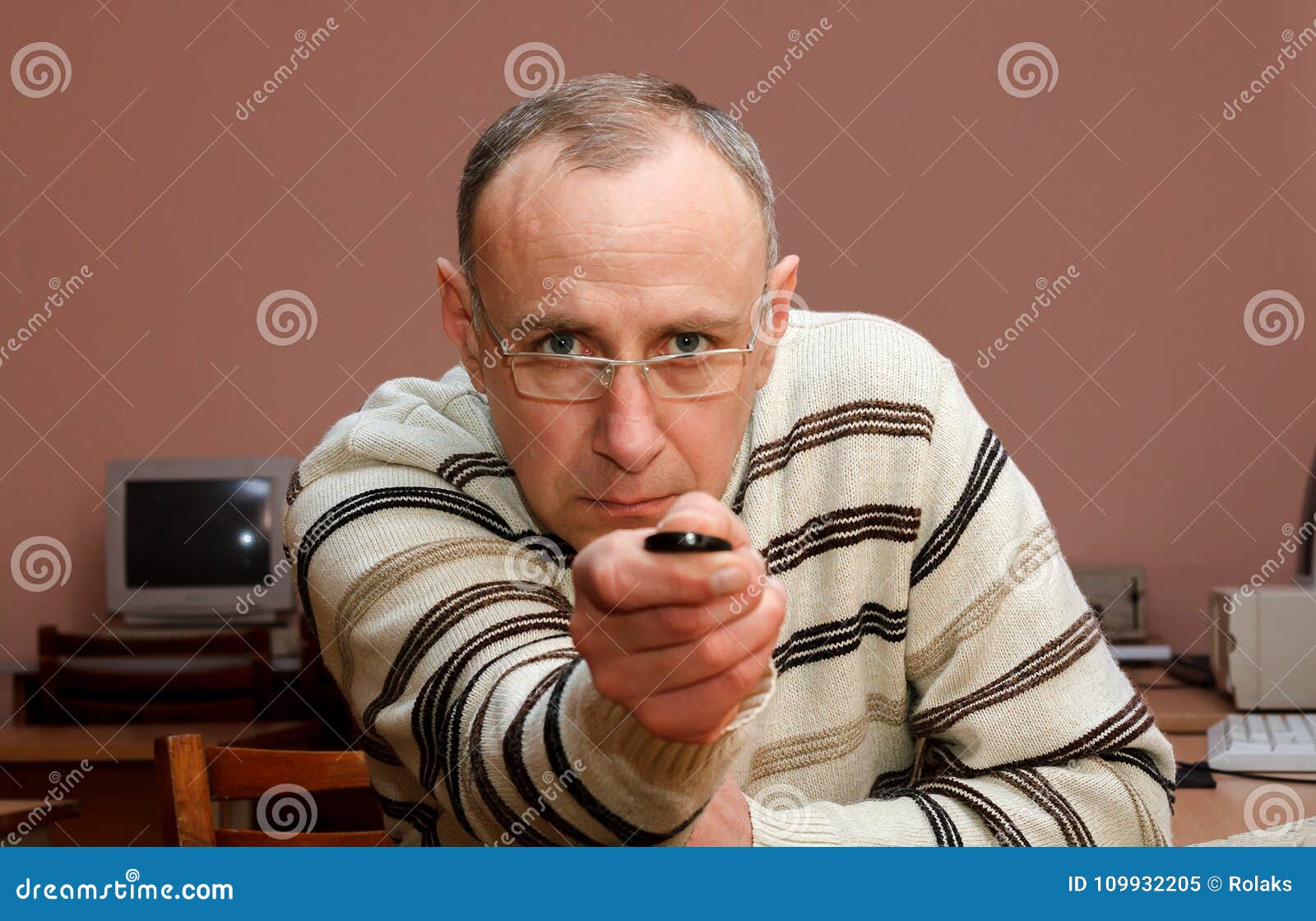 Man with remote control stock image. Image of adult - 109932205