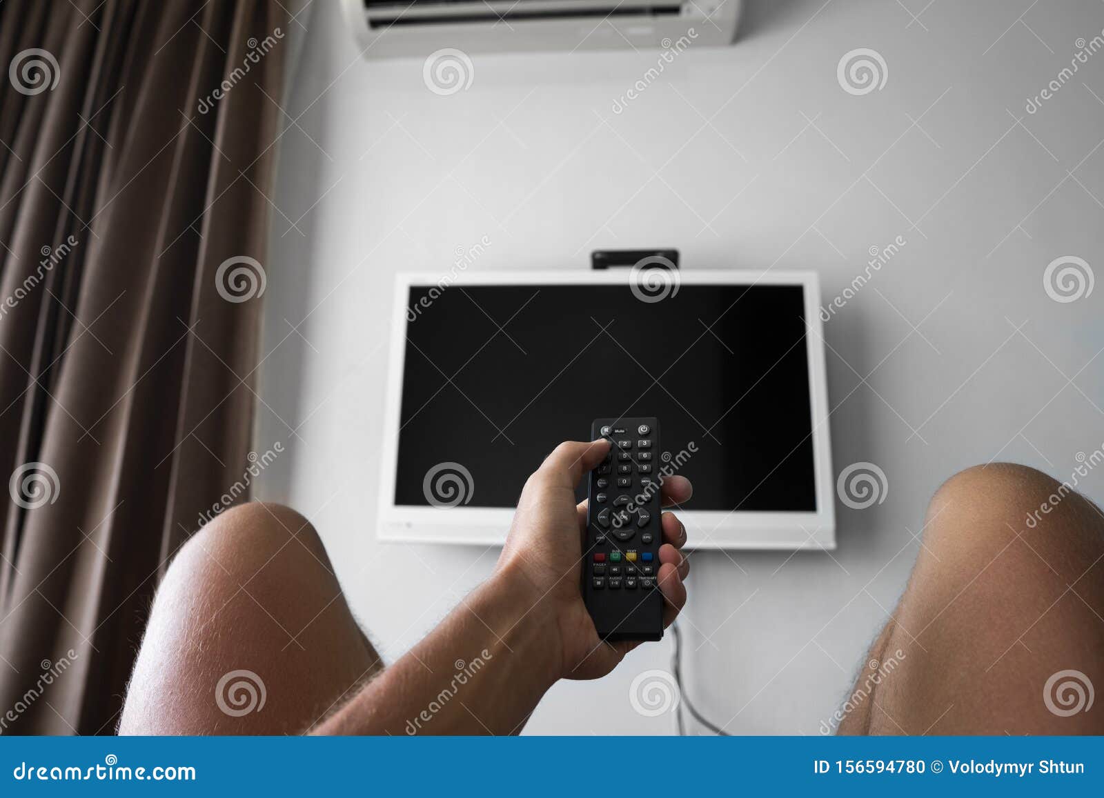 The Man with the Remote Control in Hand Want Switch on the TV and ...