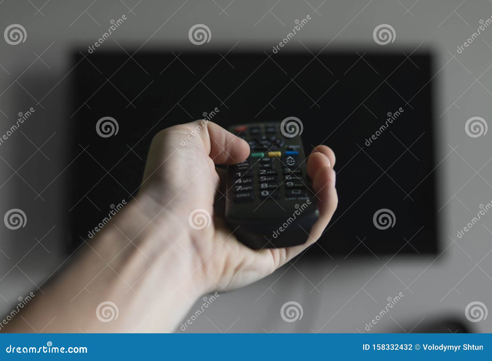 The Man with the Remote Control in Hand Want Switch on the TV and ...