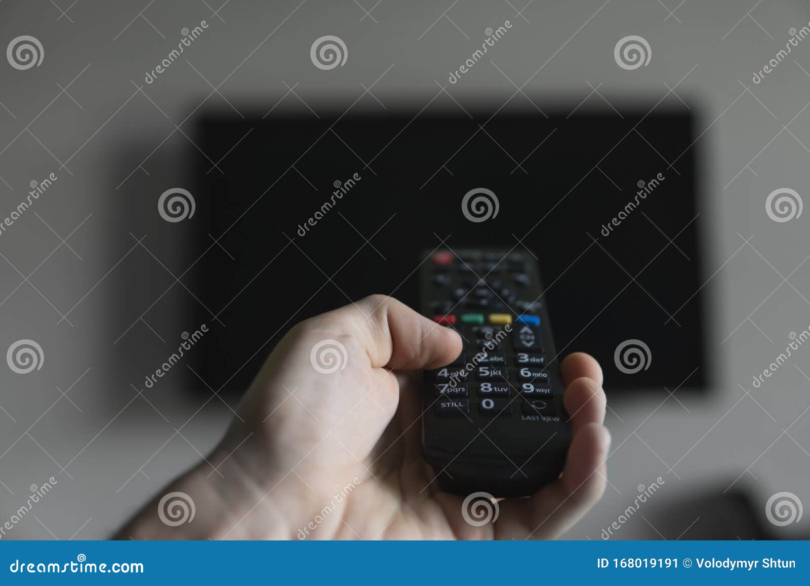 The Man with the Remote Control in Hand Want Switch on the TV and ...