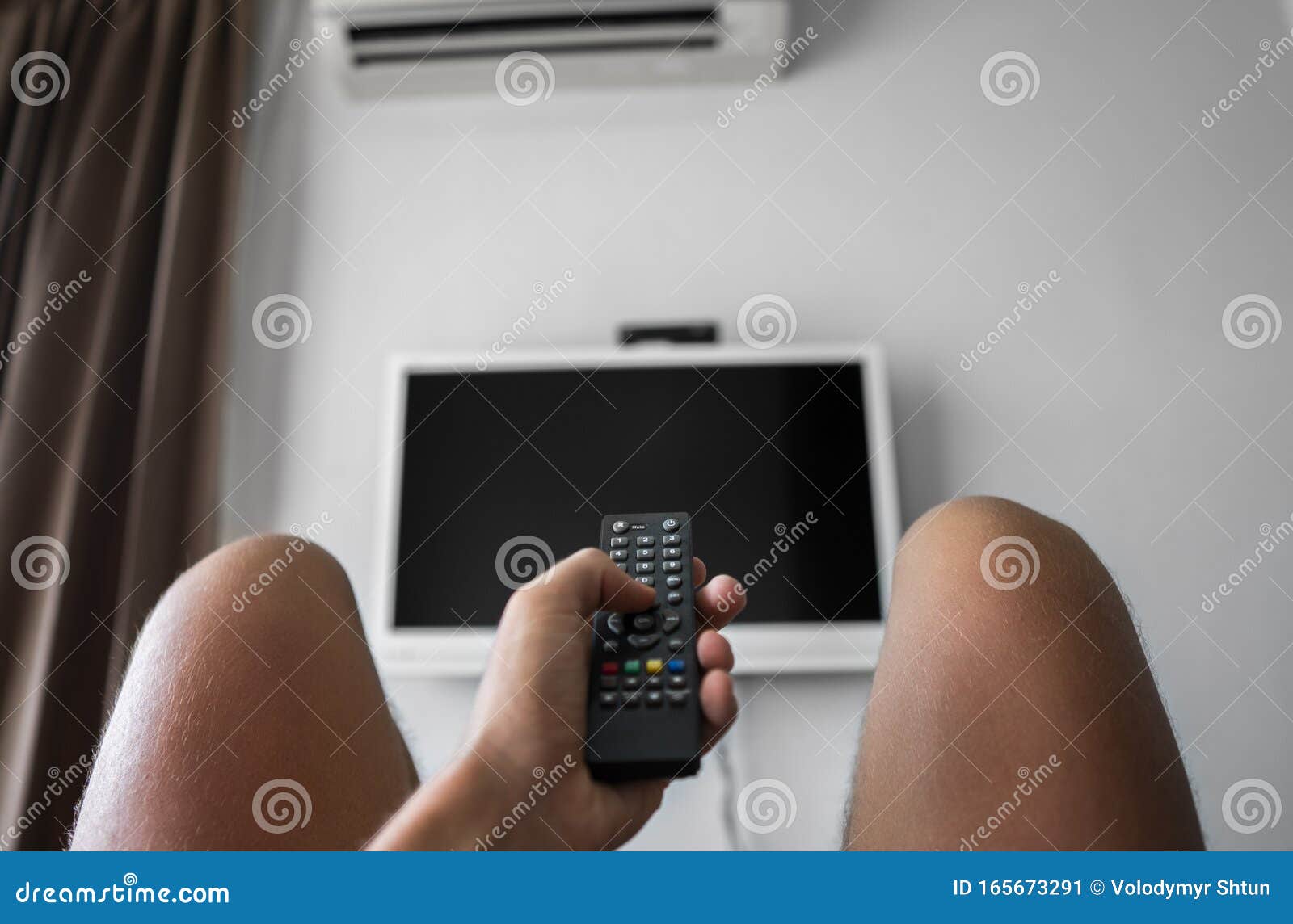 The Man with the Remote Control in Hand Want Switch on the TV and ...
