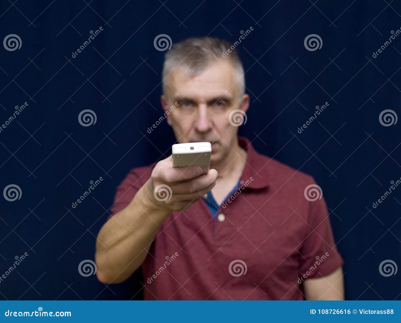 Man with Remote Control stock photo. Image of shot, technology - 108726616