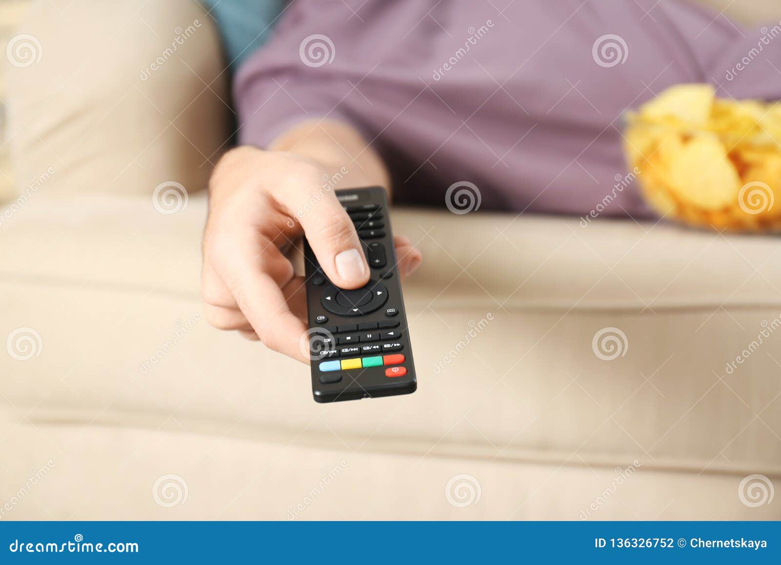 Man with Remote Control Watching TV on Sofa Stock Photo - Image of ...
