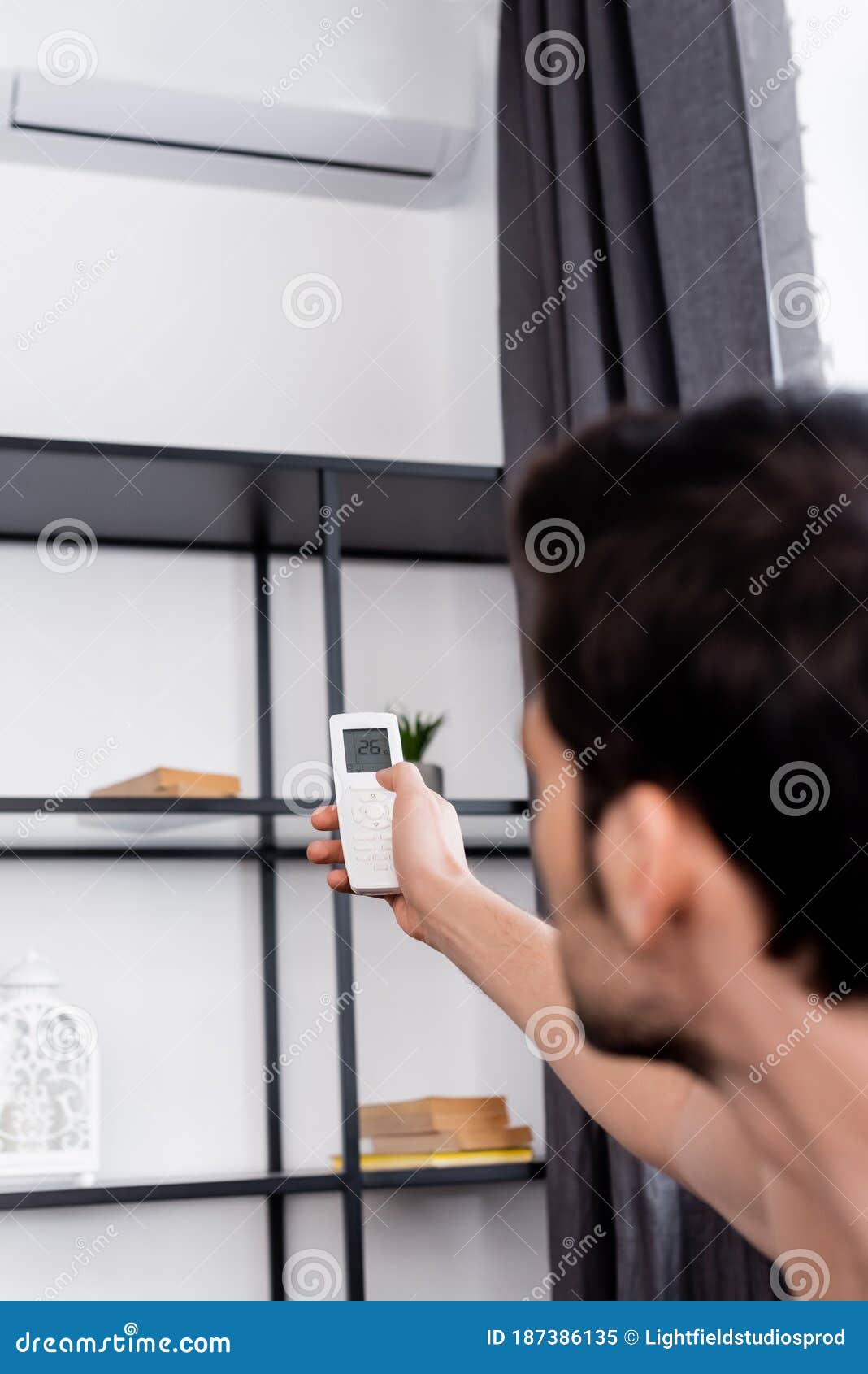 Man with Remote Controller Adjusting Temperature Stock Image - Image of ...