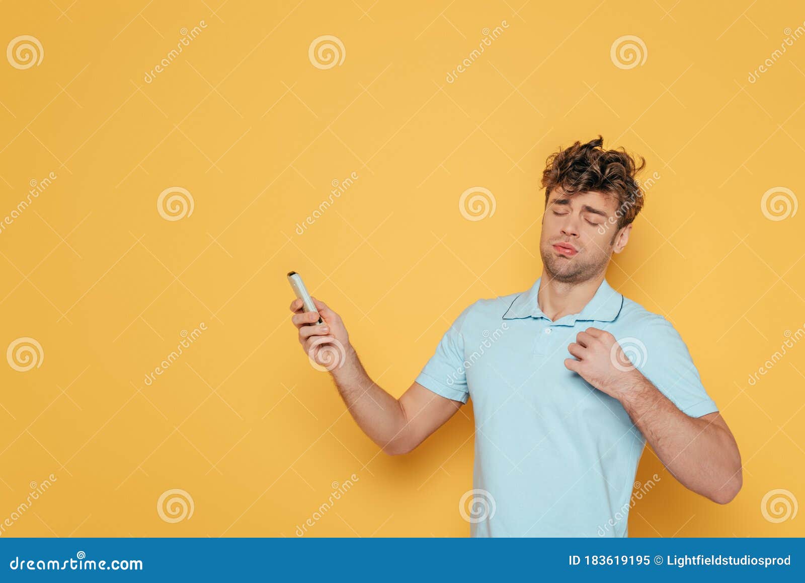 Man with Remote Controller in Outstretched Hand Suffering from Heat ...