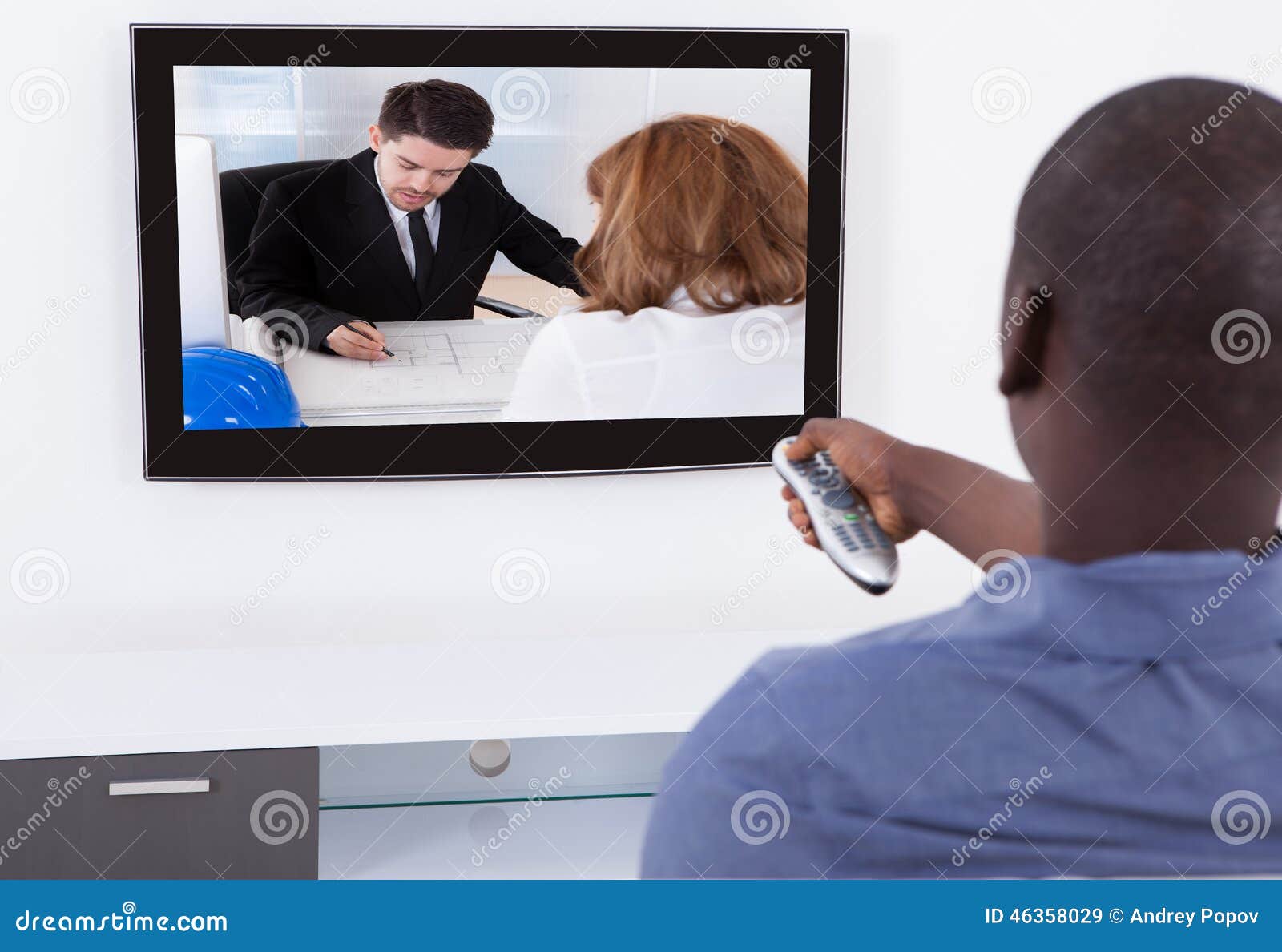 Man with Remote Watching Television Stock Image - Image of leisure ...