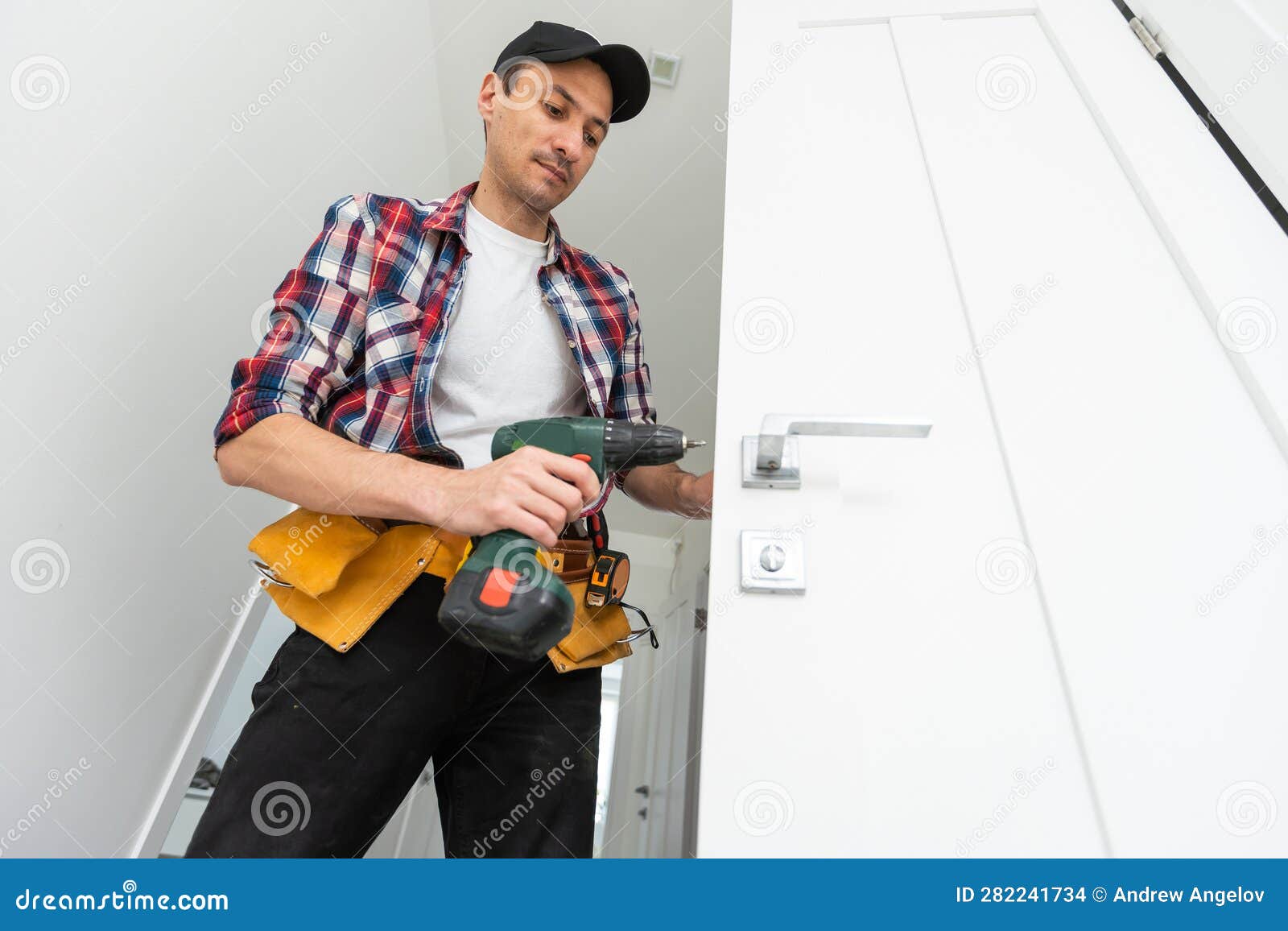 Man Removing Lock from Door Stock Photo - Image of indoor, entrance ...