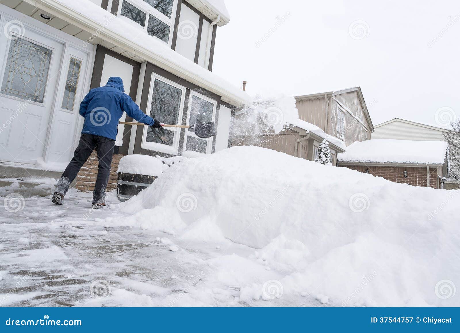 Man Removing Snow with a Shovel Stock Image - Image of cold ...
