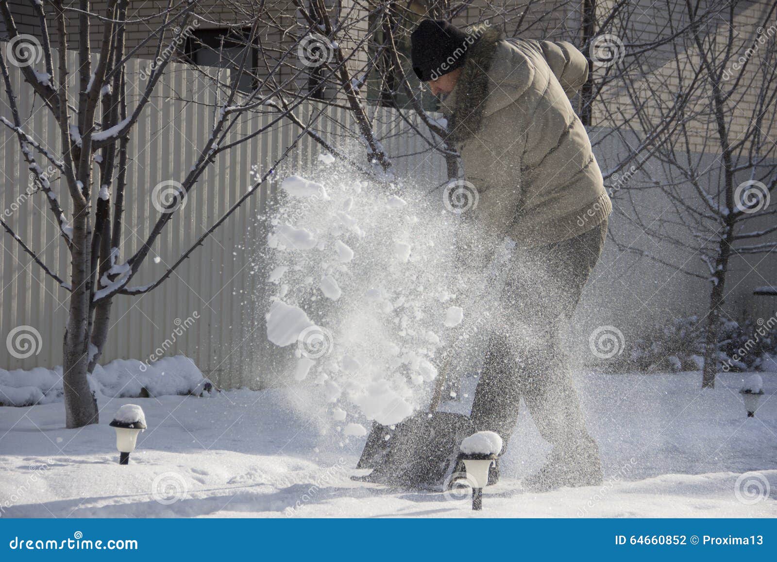 Man Removing Snow with a Shovel Stock Photo - Image of people, freezing ...