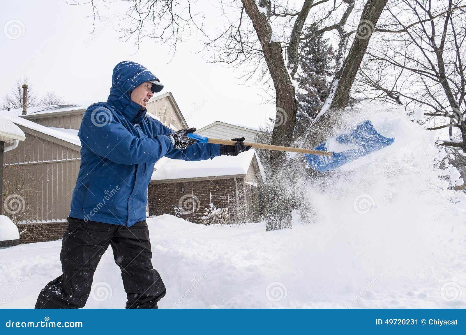Man Removing Snow with a Shovel #5 Stock Image - Image of residential ...