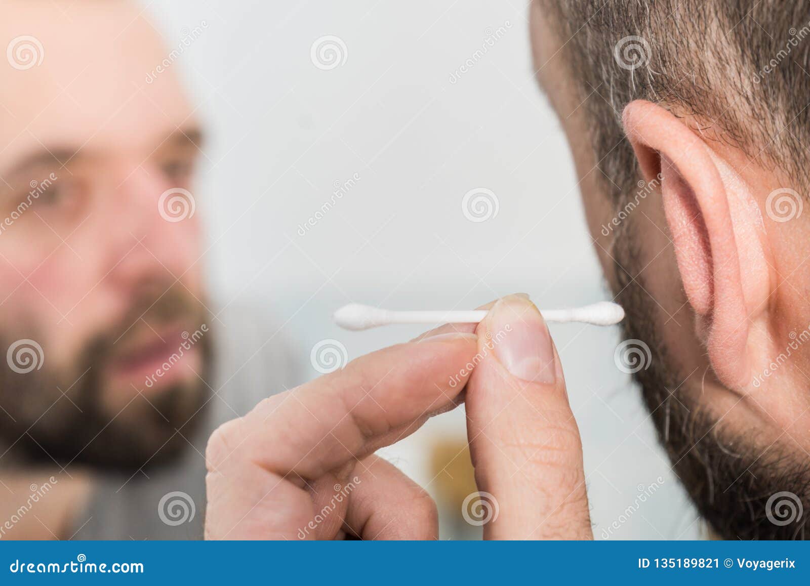 Man Removing Wax From Ear Using Q Tip Stock Image Image Of Swab Buds 135189821