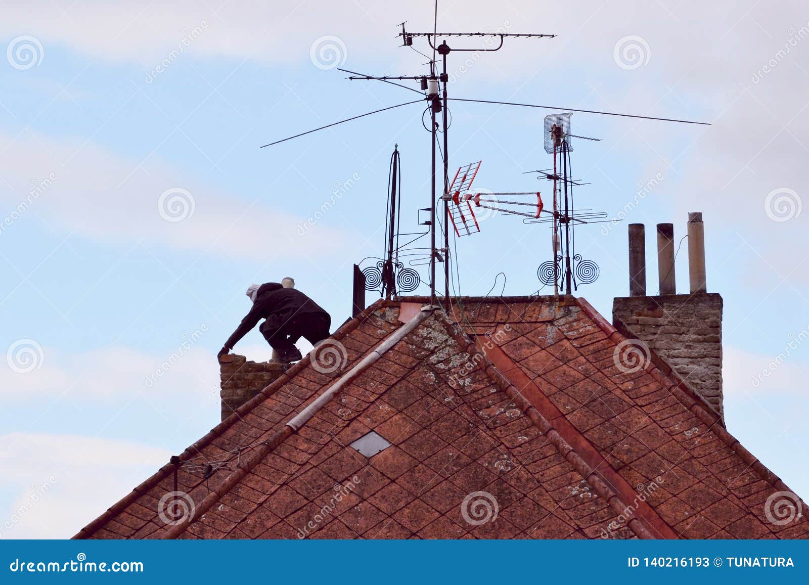 Man Renovating an Old Chimney on the Rooftop Editorial Stock Photo ...