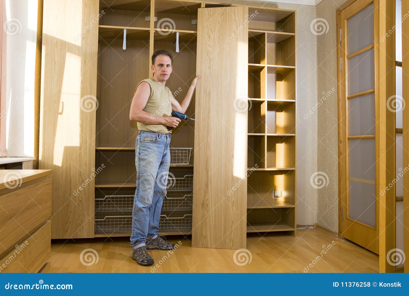 The man in repair stock photo. Image of contractor, furniture - 11376258