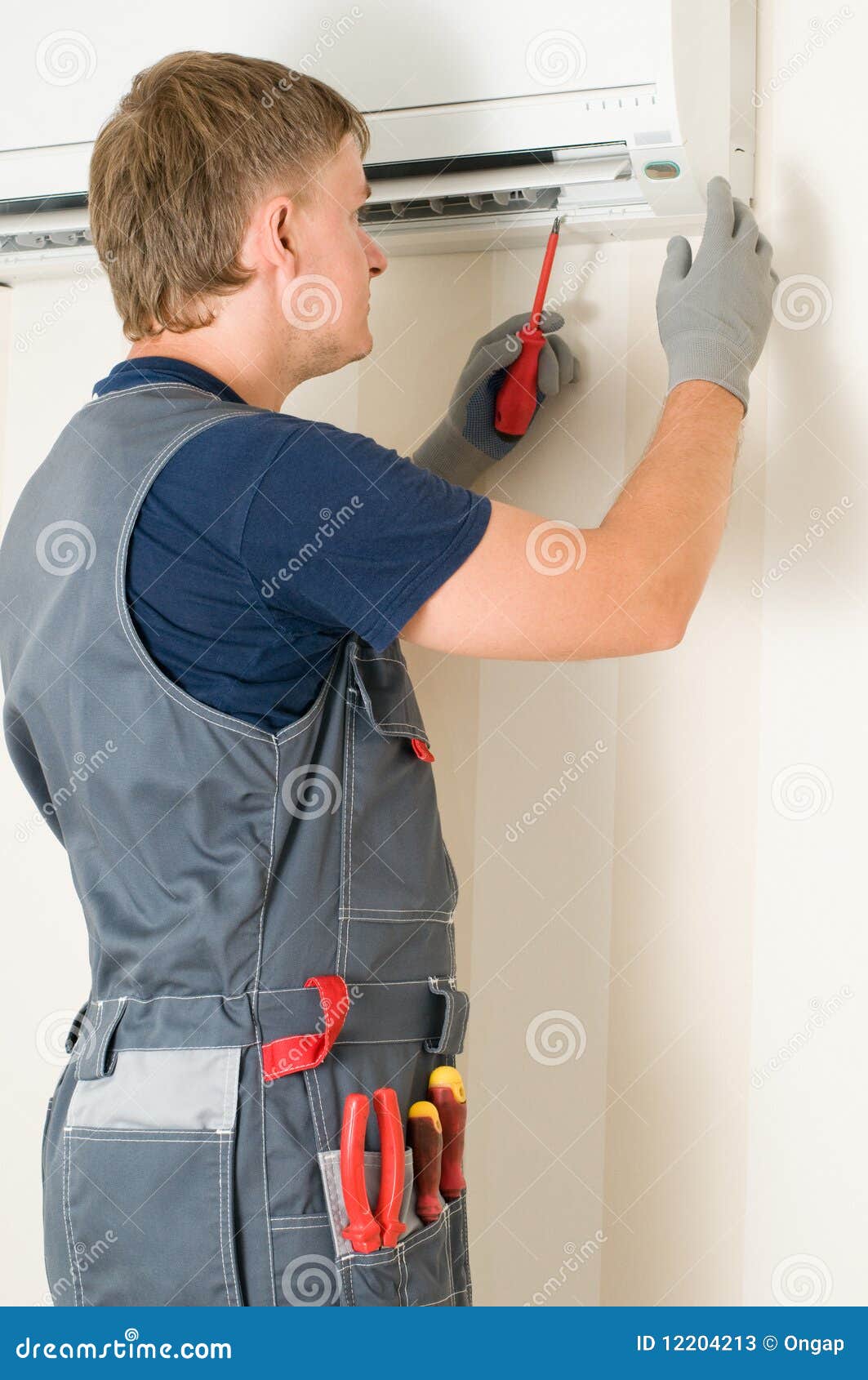 Man repair air-conditioner stock image. Image of working - 12204213