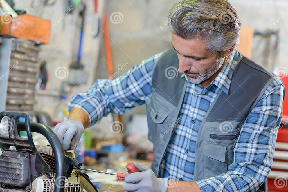 Man Repair Brush Cutter Engine Stock Photo - Image of mowing, prior ...