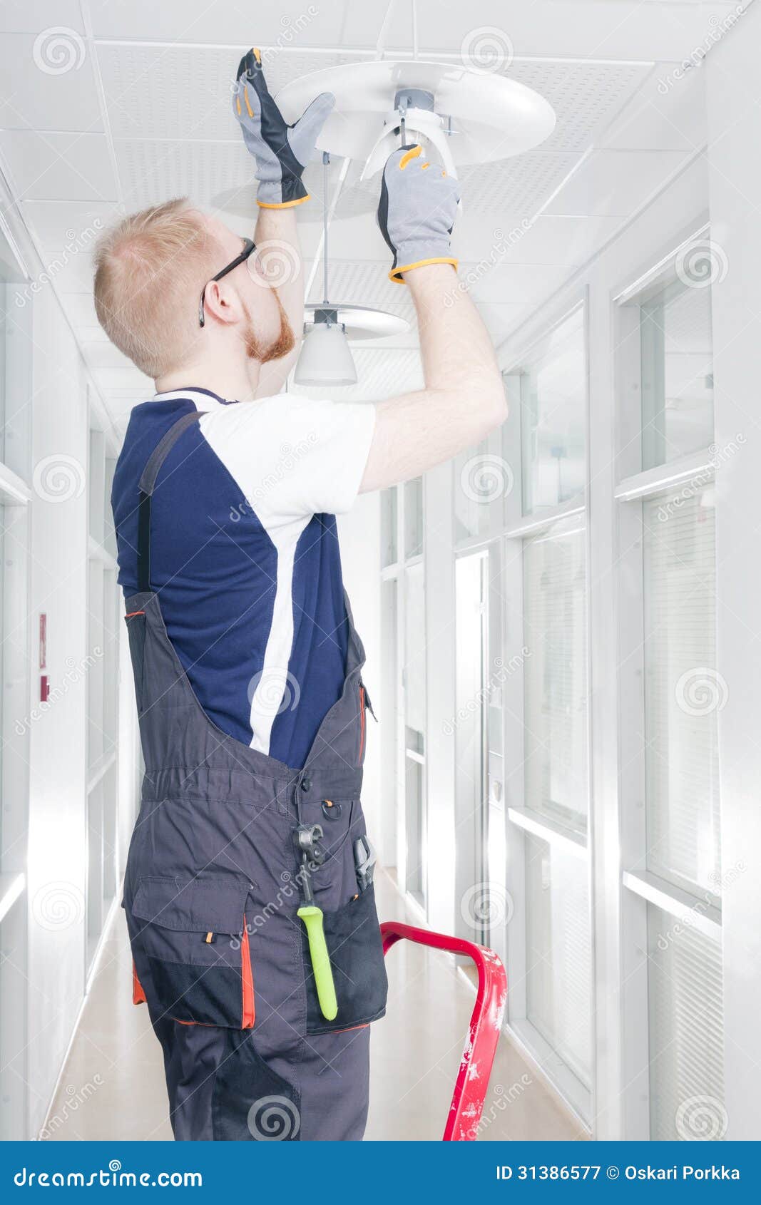 Man Repairing Broken Light stock image. Image of service - 31386577