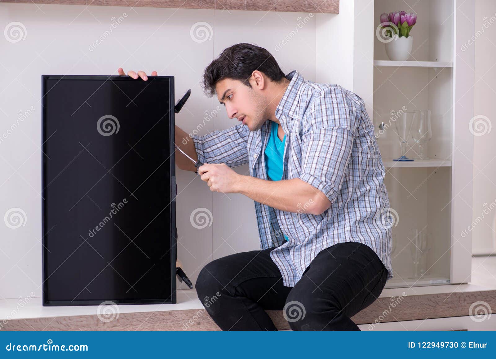 The Man Repairing Broken Tv at Home Stock Photo - Image of contractor ...