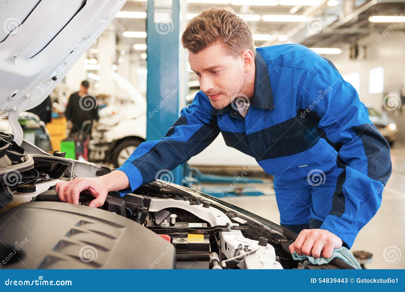Man repairing car. stock image. Image of caucasian, occupation - 54839443