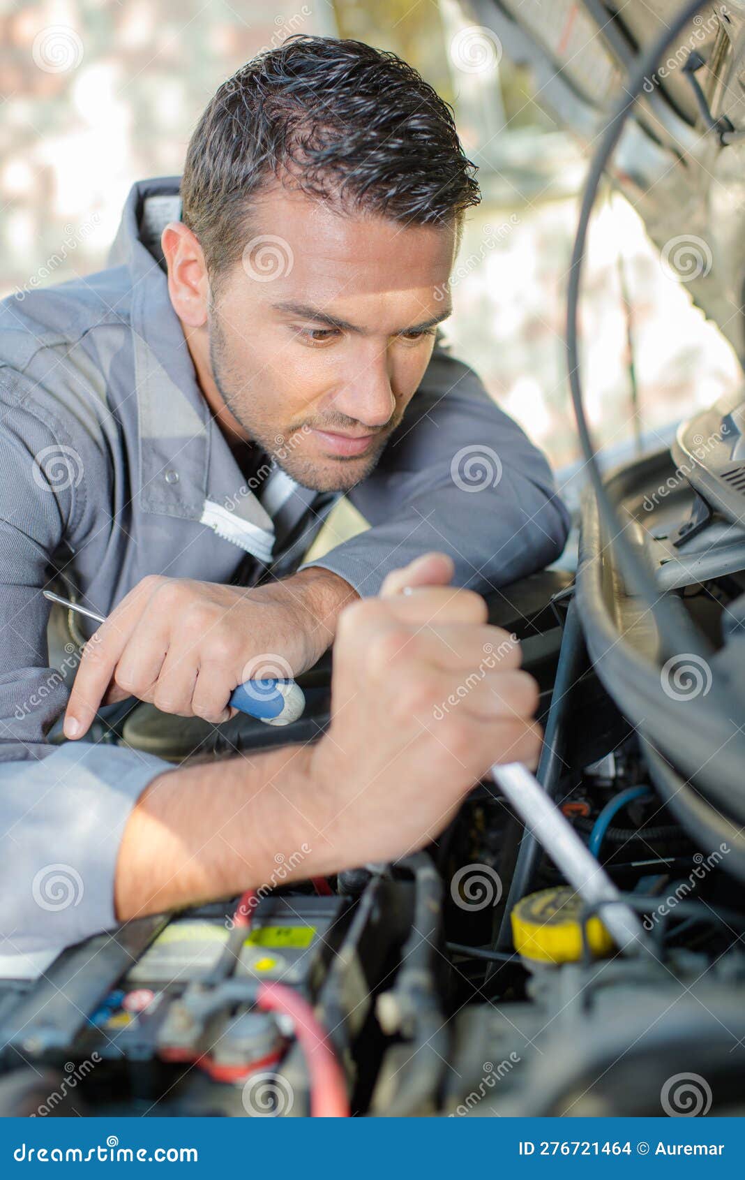 Man repairing car engine stock photo. Image of problem - 276721464