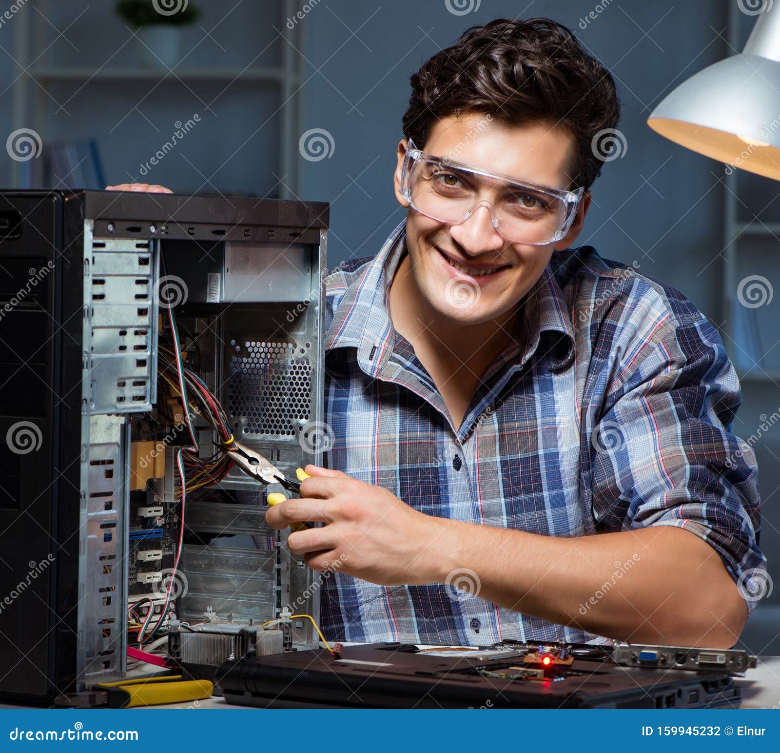 Man Repairing Computer Desktop with Pliers Stock Photo - Image of happy ...