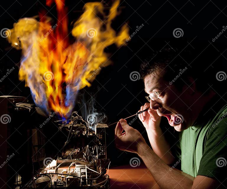 Man Repairing Computer on Fire Stock Image - Image of plug, fuse: 12884843