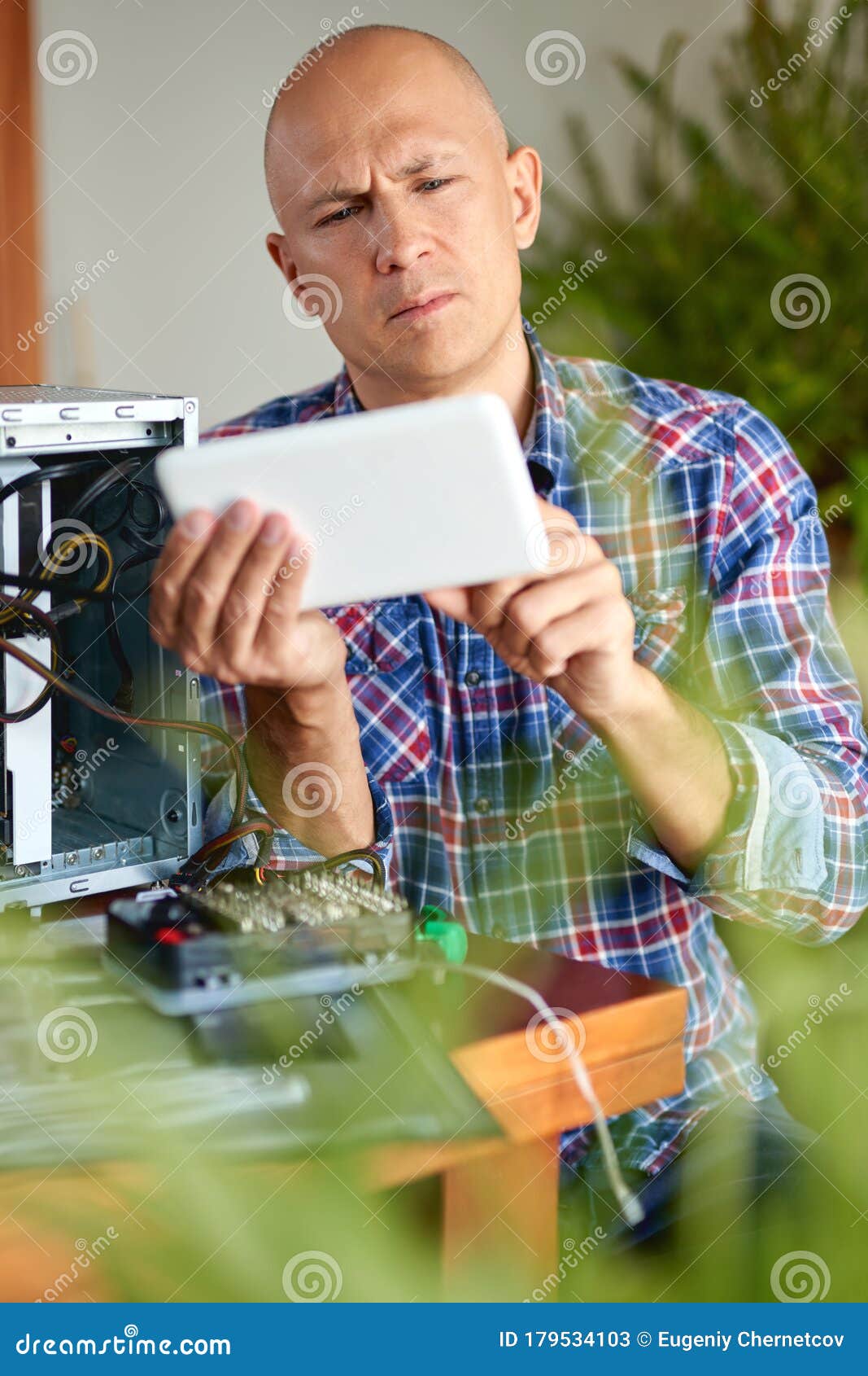 Man repairing computer stock image. Image of inside - 179534103