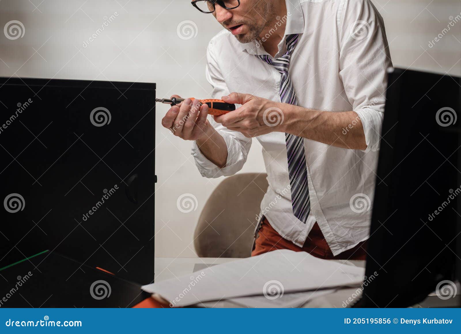 Man repairing computer stock photo. Image of problem - 205195856