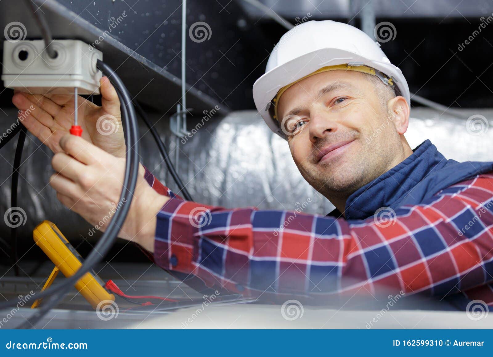 Man Repairing Electrical Wiring on Ceiling Stock Photo - Image of dark ...