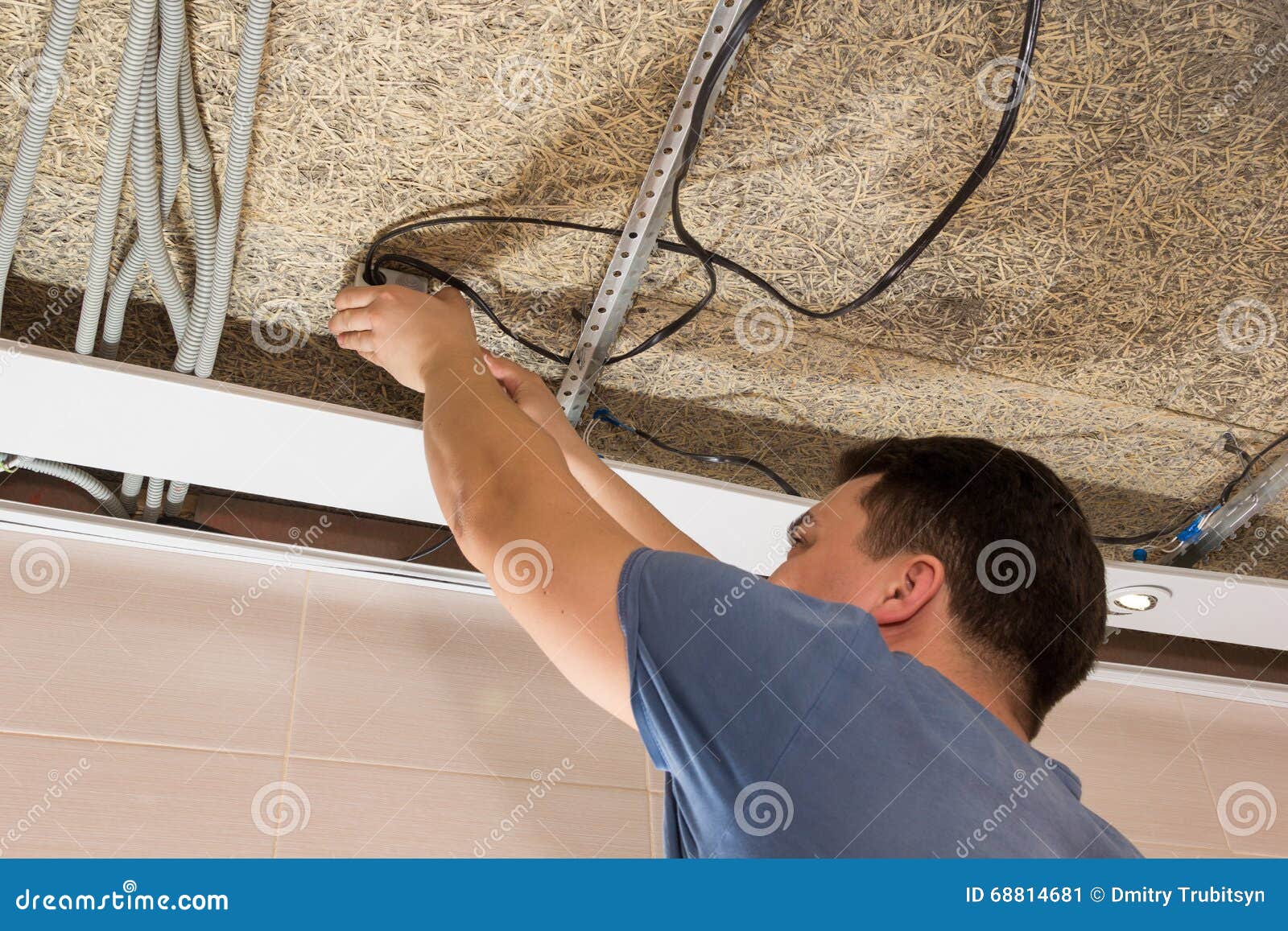 Man Repairing Electrical Wiring on Ceiling Stock Image - Image of pipe ...