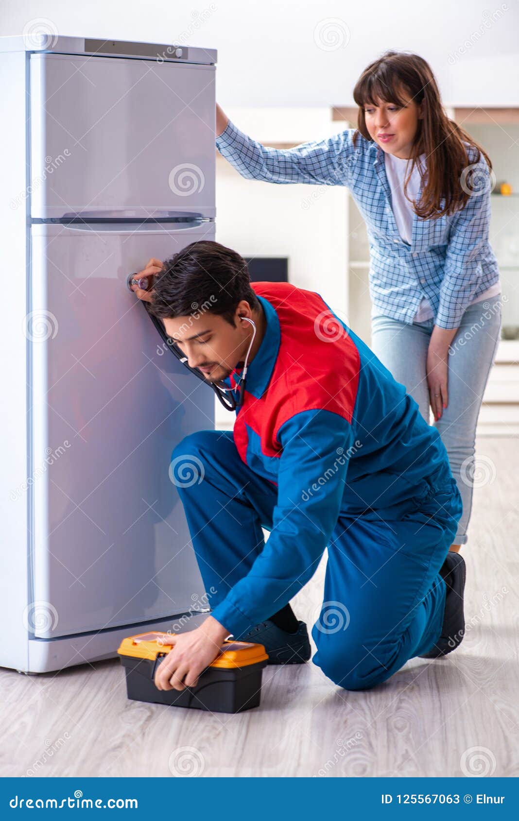 The Man Repairing Fridge with Customer Stock Image - Image of home ...