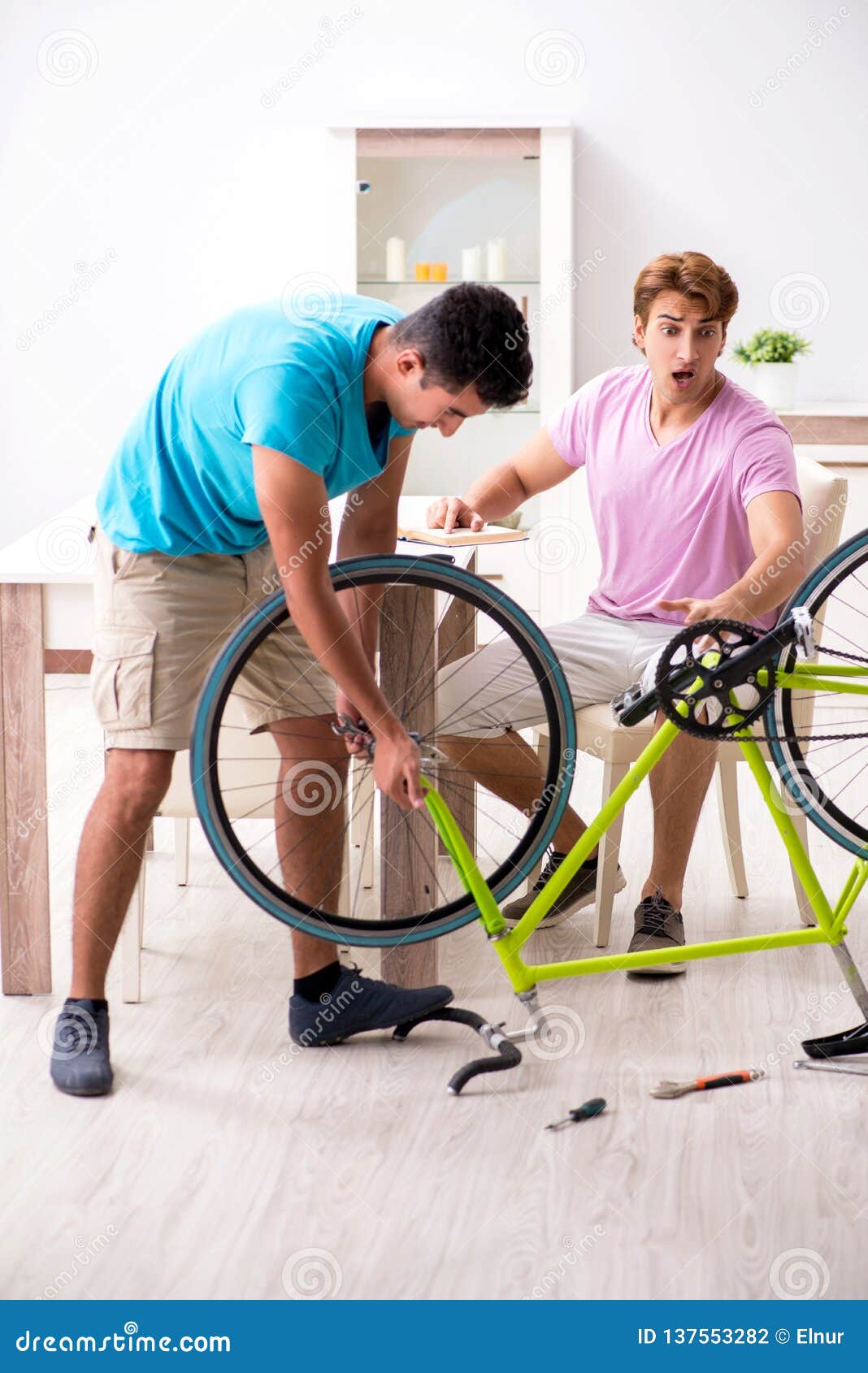 The Man Repairing His Broken Bicycle Stock Photo - Image of cyclist ...