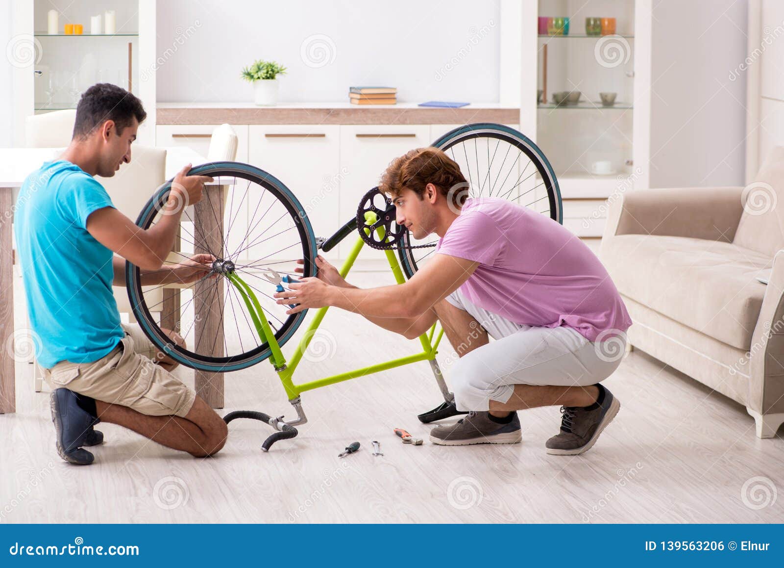 The Man Repairing His Broken Bicycle Stock Photo - Image of chain, gear ...