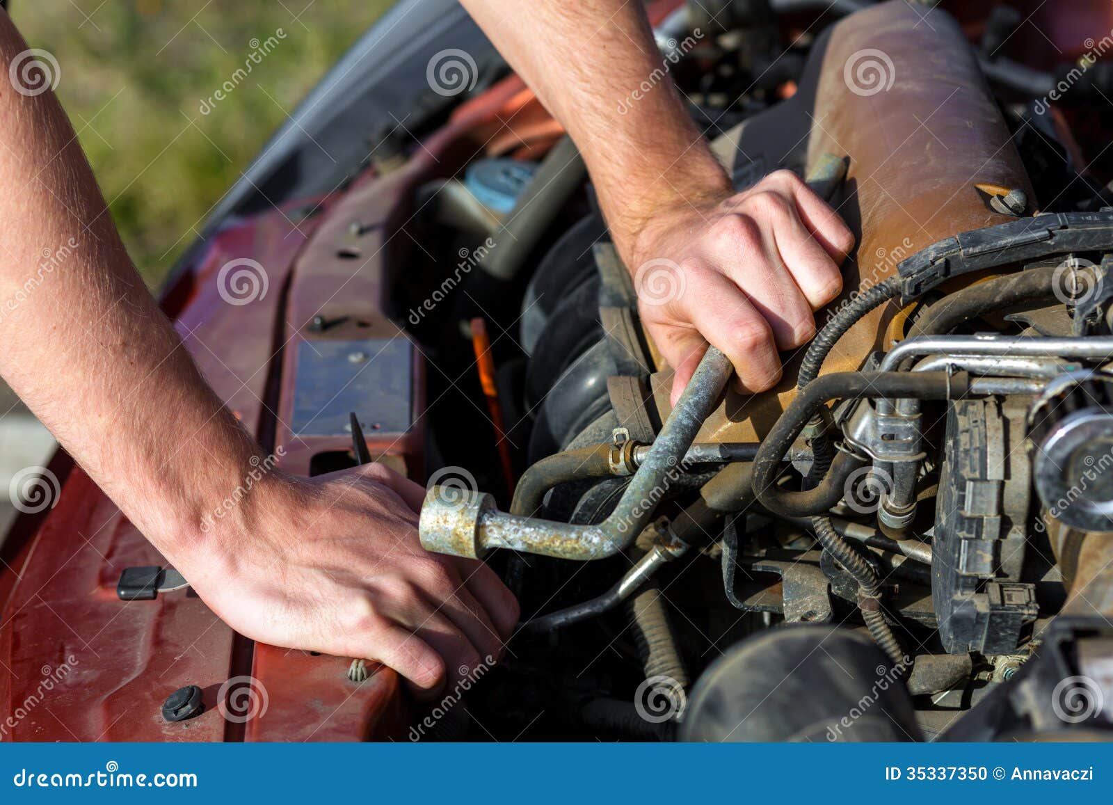 Man repairing motor block stock photo. Image of industry - 35337350