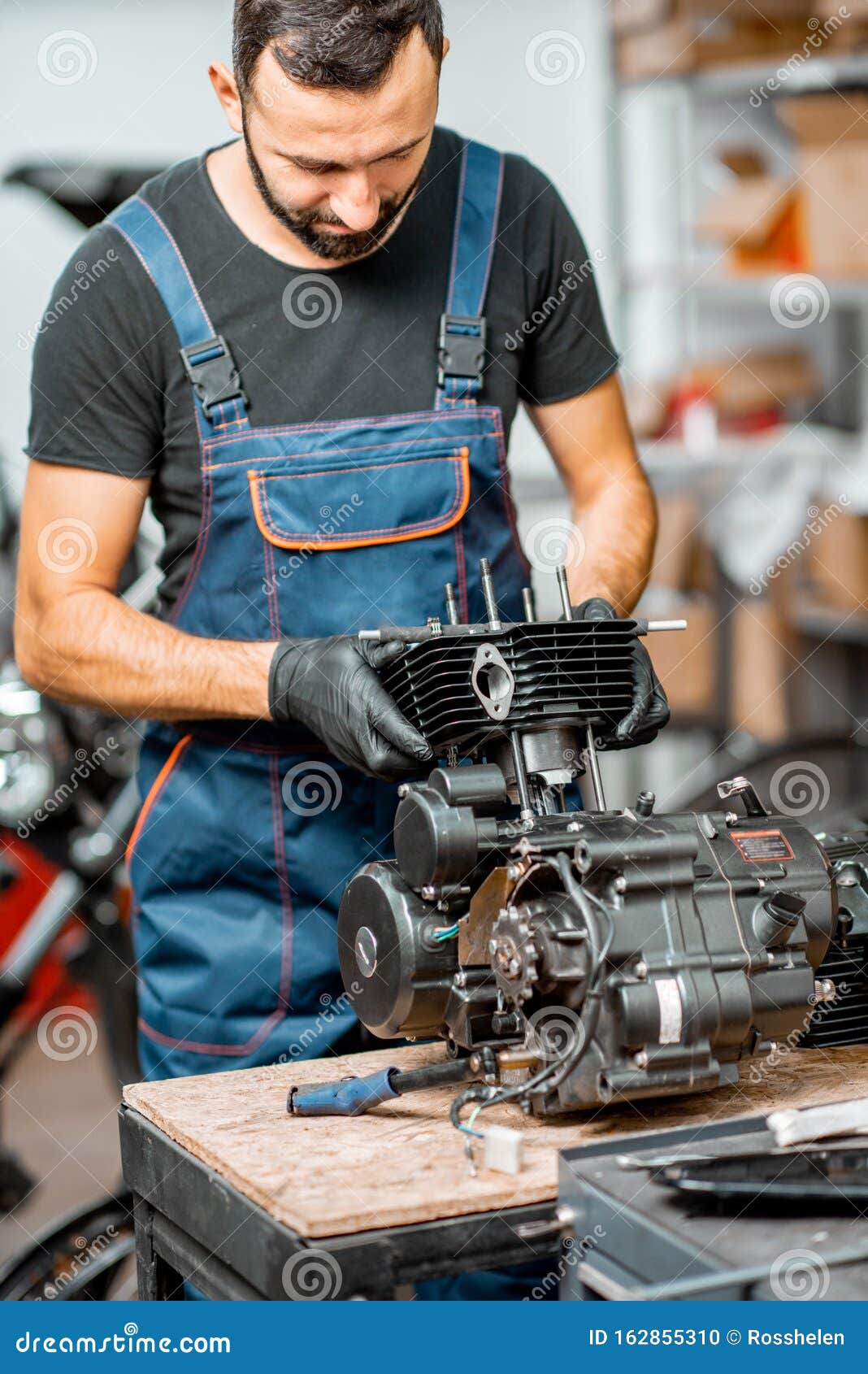 Man Repairing Motorcycle Engine Stock Photo - Image of auto, bike ...