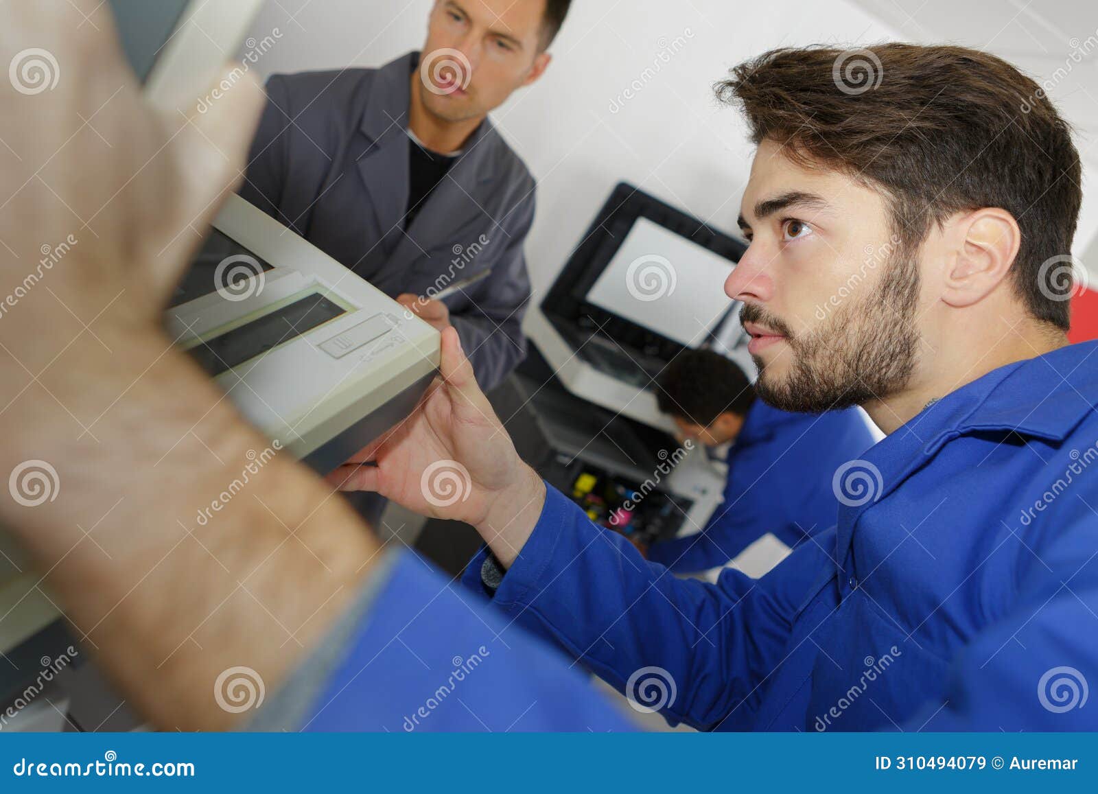 Man Repairing Printer in Professional School Stock Image - Image of ...