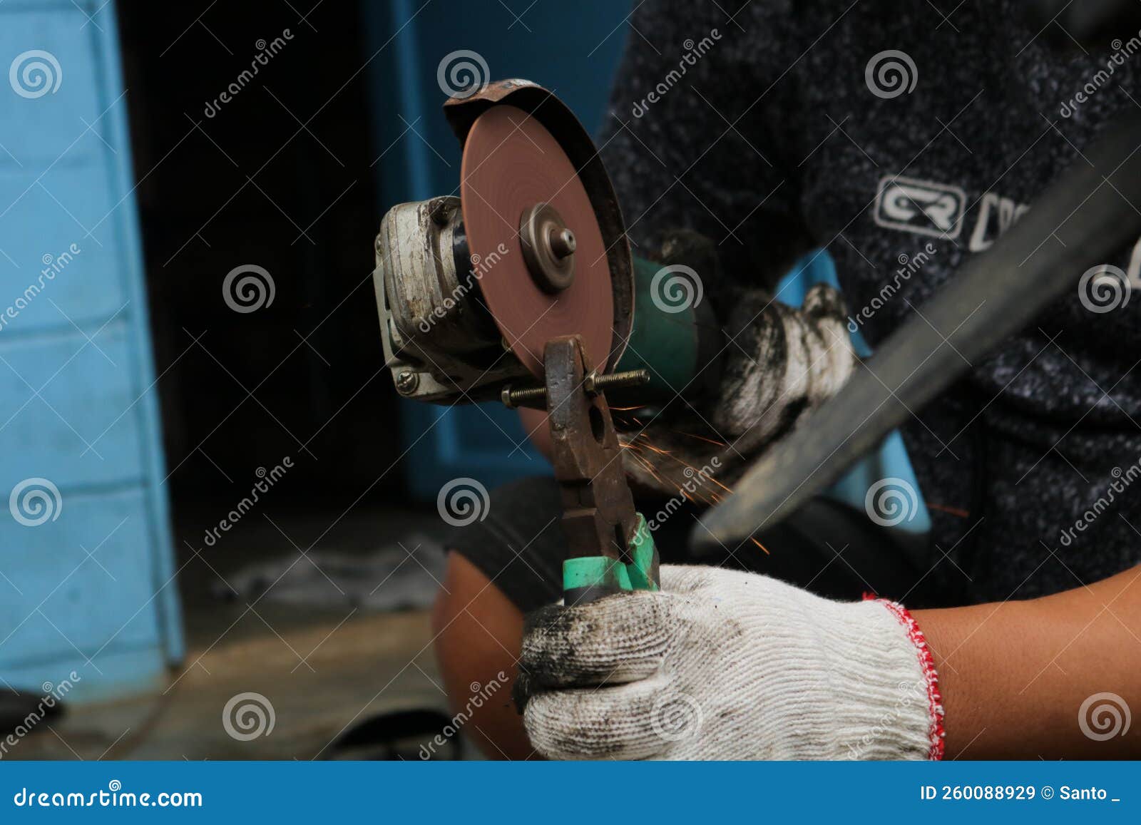 A Man is Repairing Something at the Workshop Stock Image - Image of ...