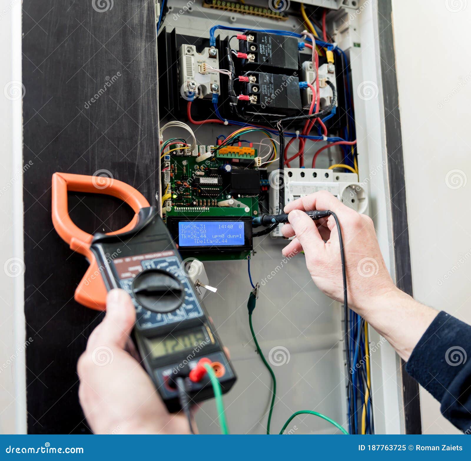 The Man is Repairing the Switchboard Voltage with Automatic Switches ...