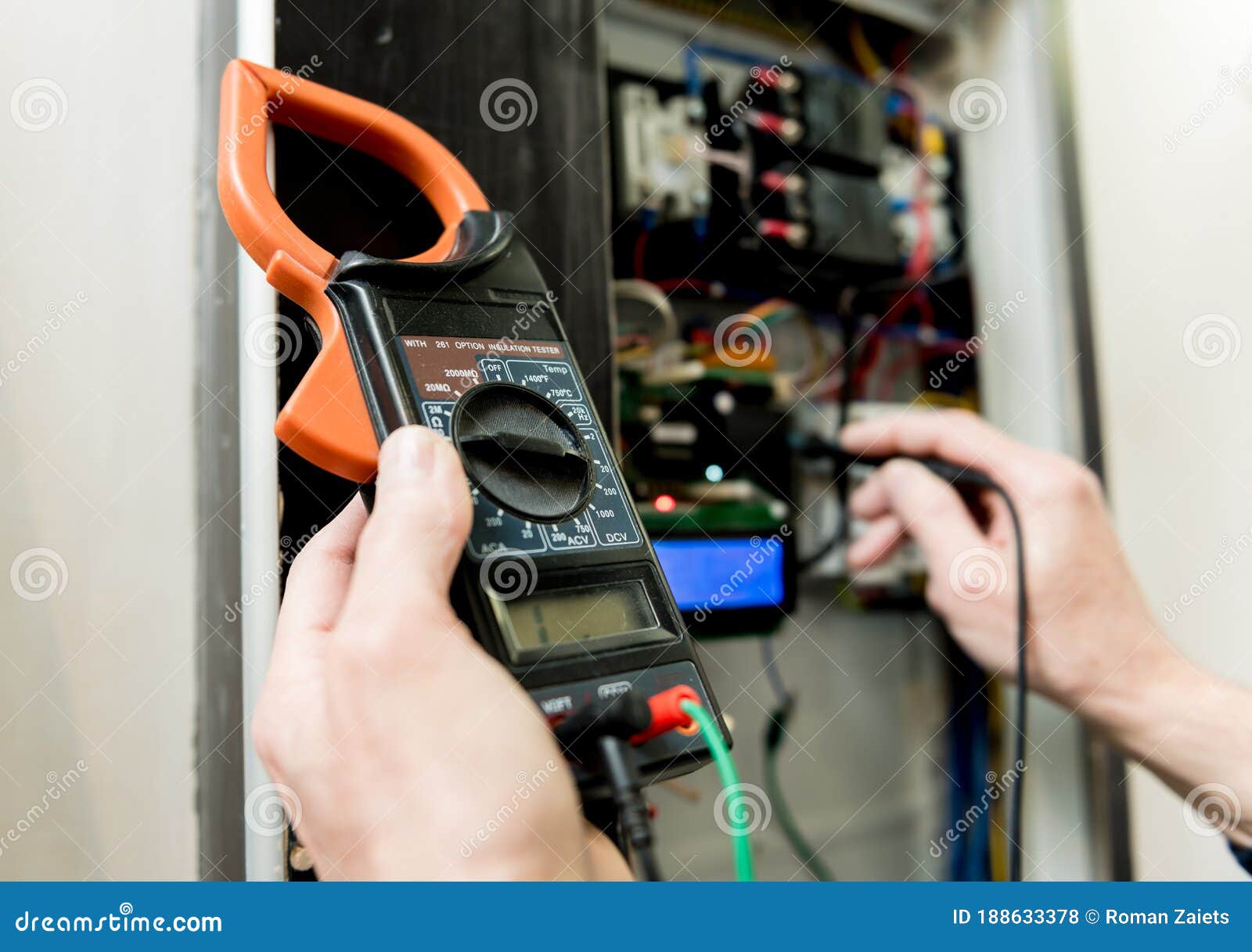 The Man is Repairing the Switchboard Voltage with Automatic Switches ...