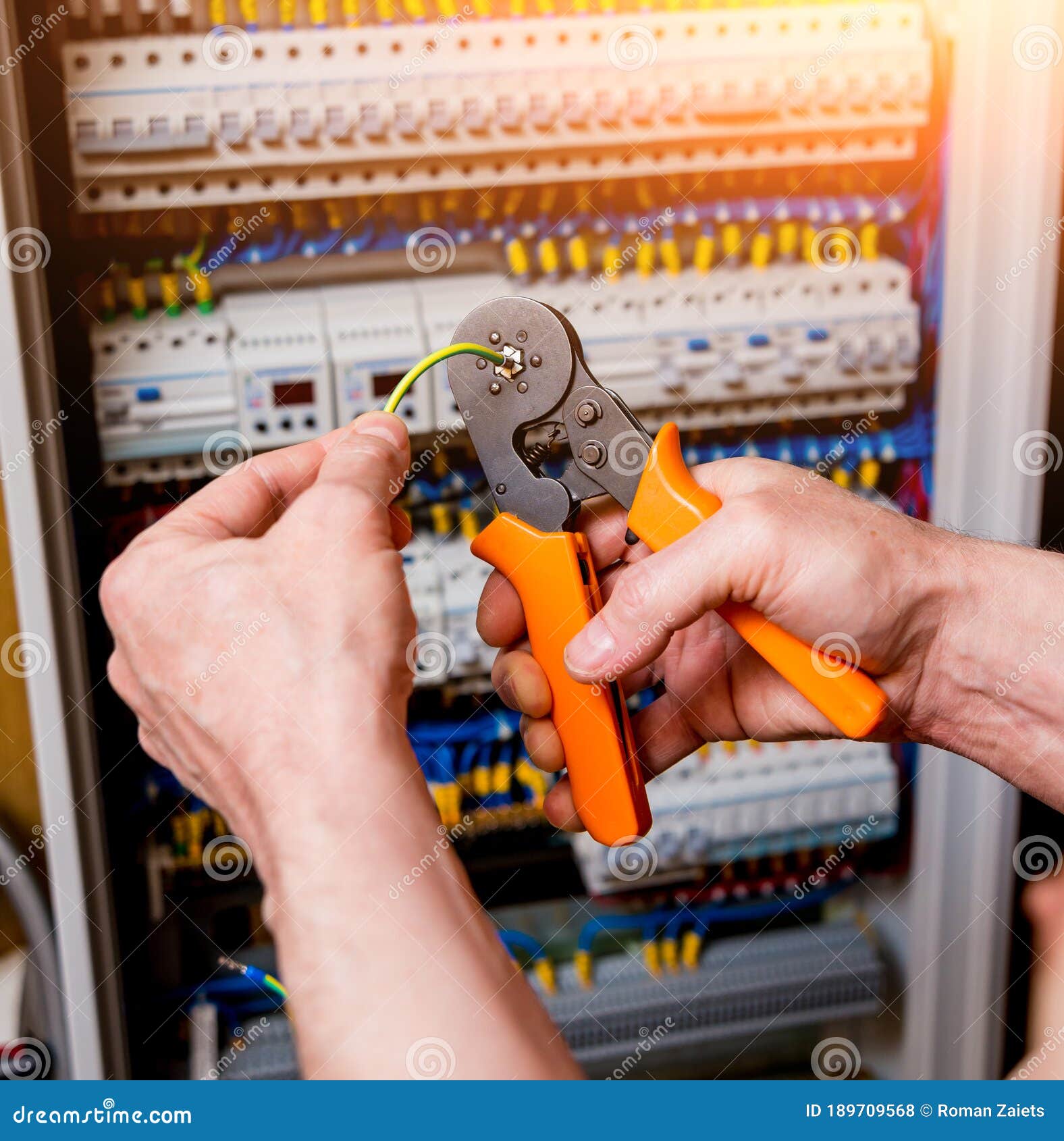 The Man is Repairing the Switchboard Voltage with Automatic Switches ...
