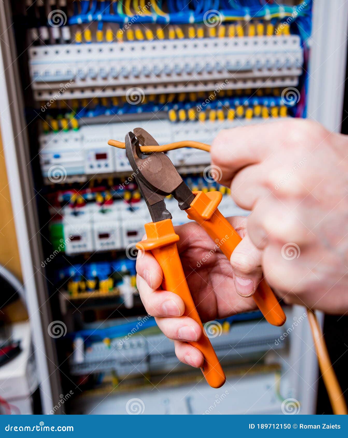 The Man is Repairing the Switchboard Voltage with Automatic Switches ...