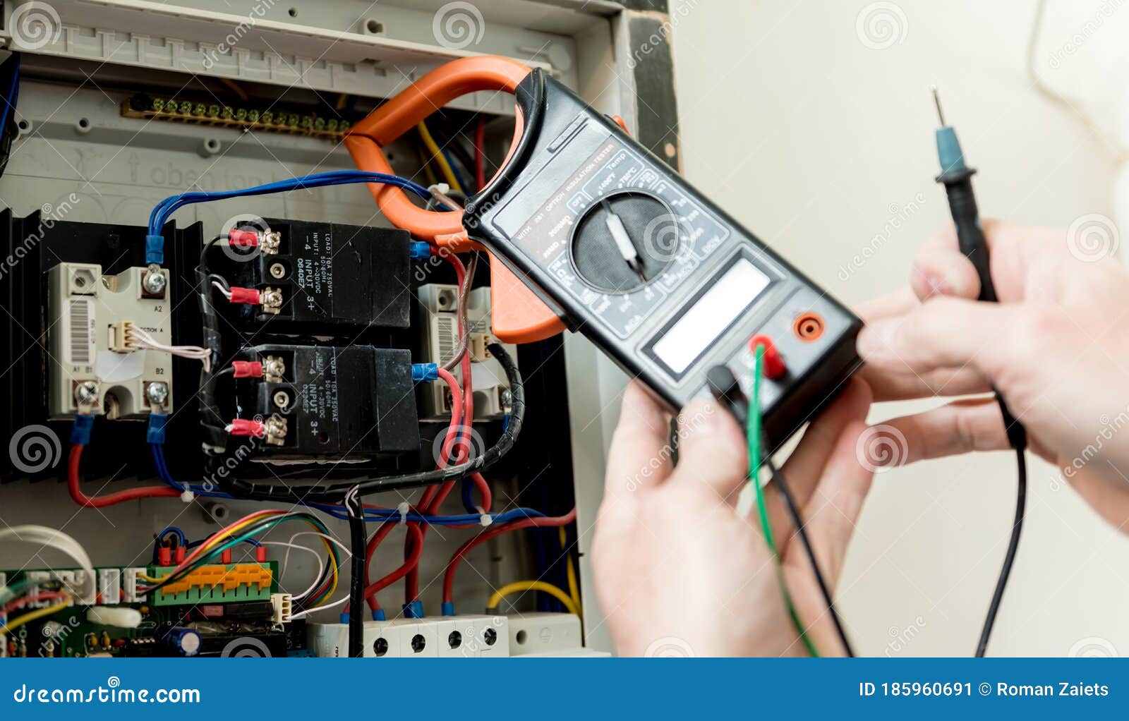The Man is Repairing the Switchboard Voltage with Automatic Switches ...