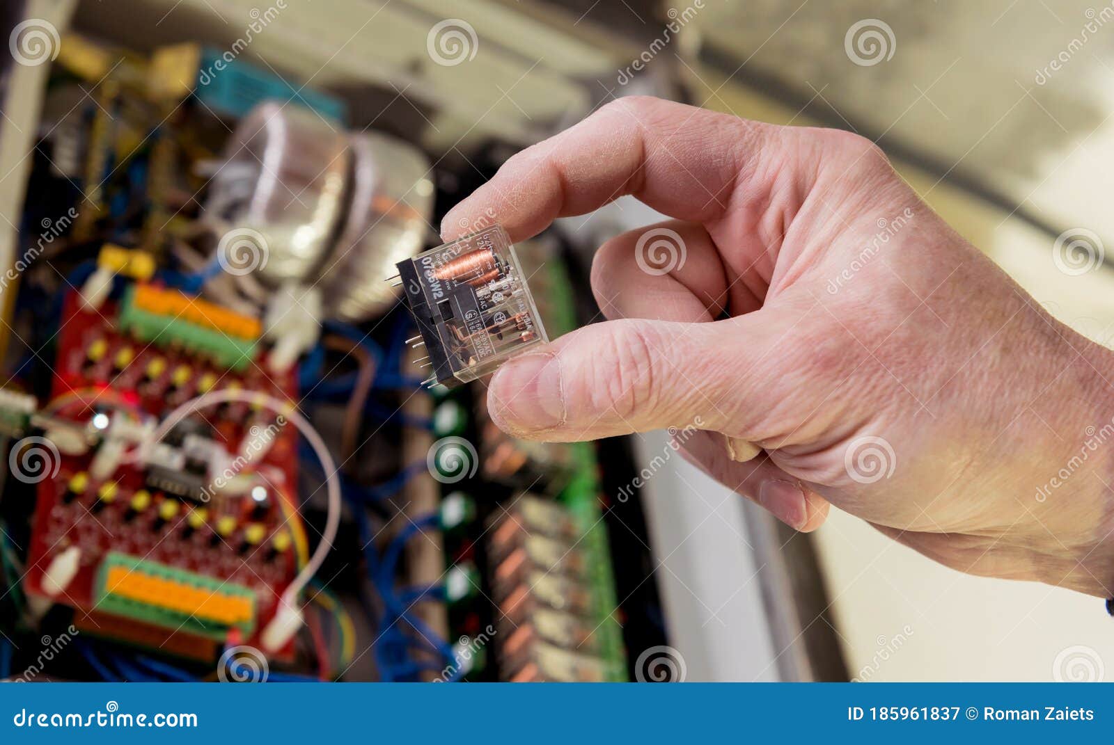 The Man is Repairing the Switchboard Voltage with Automatic Switches ...