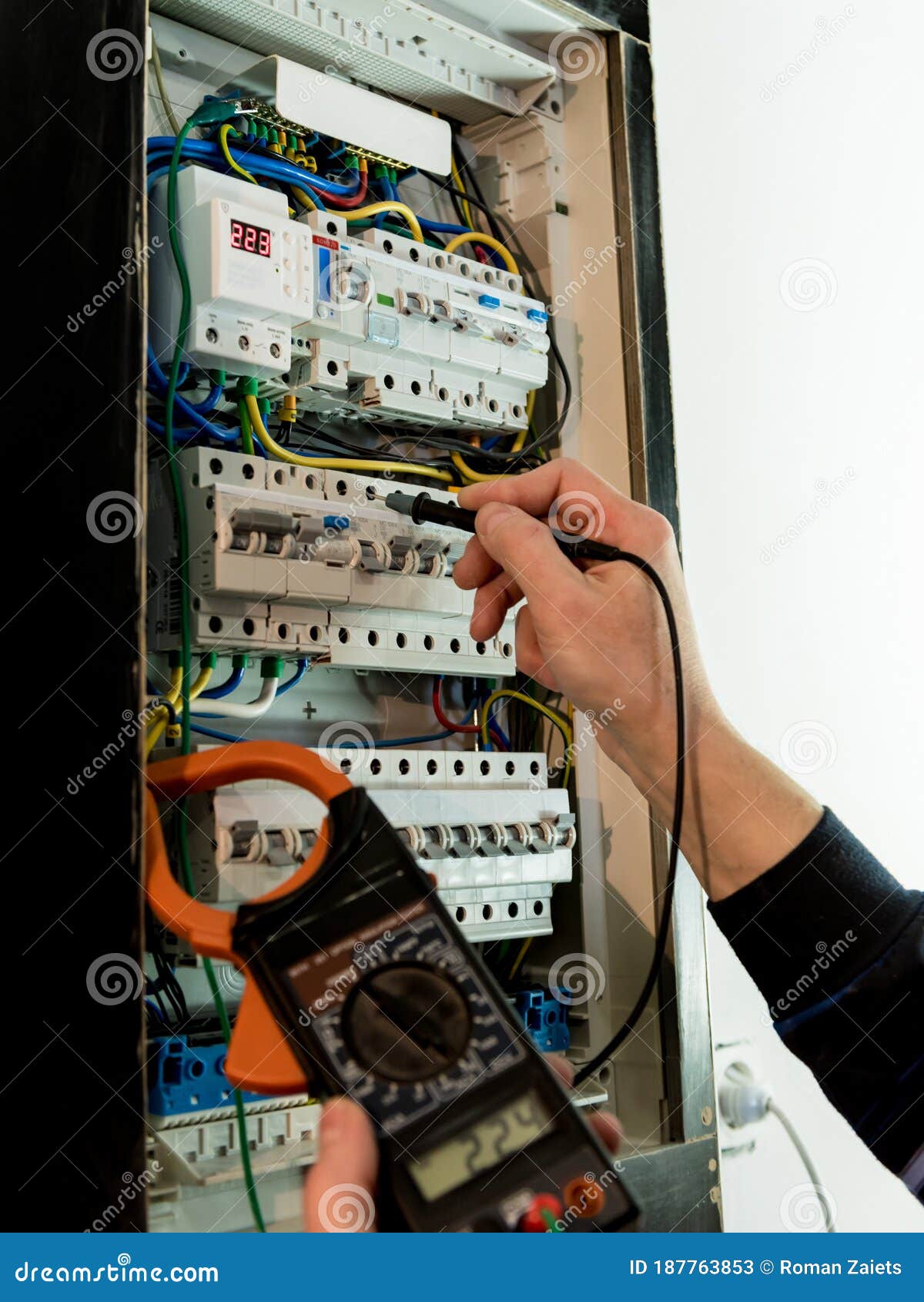 The Man is Repairing the Switchboard Voltage with Automatic Switches ...